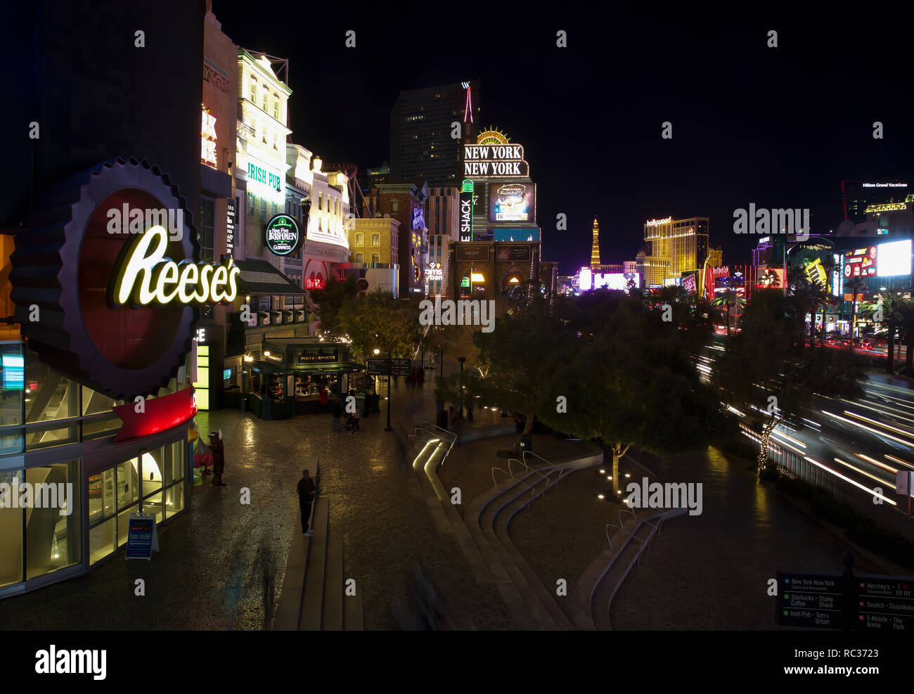Las Vegas Boulevard famously known as the strip lit up in the evening Stock Photo - Alamy
