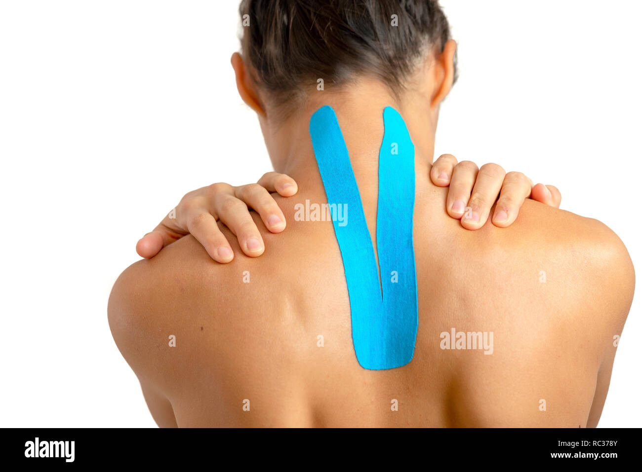Female back with physio tape on white background Stock Photo - Alamy