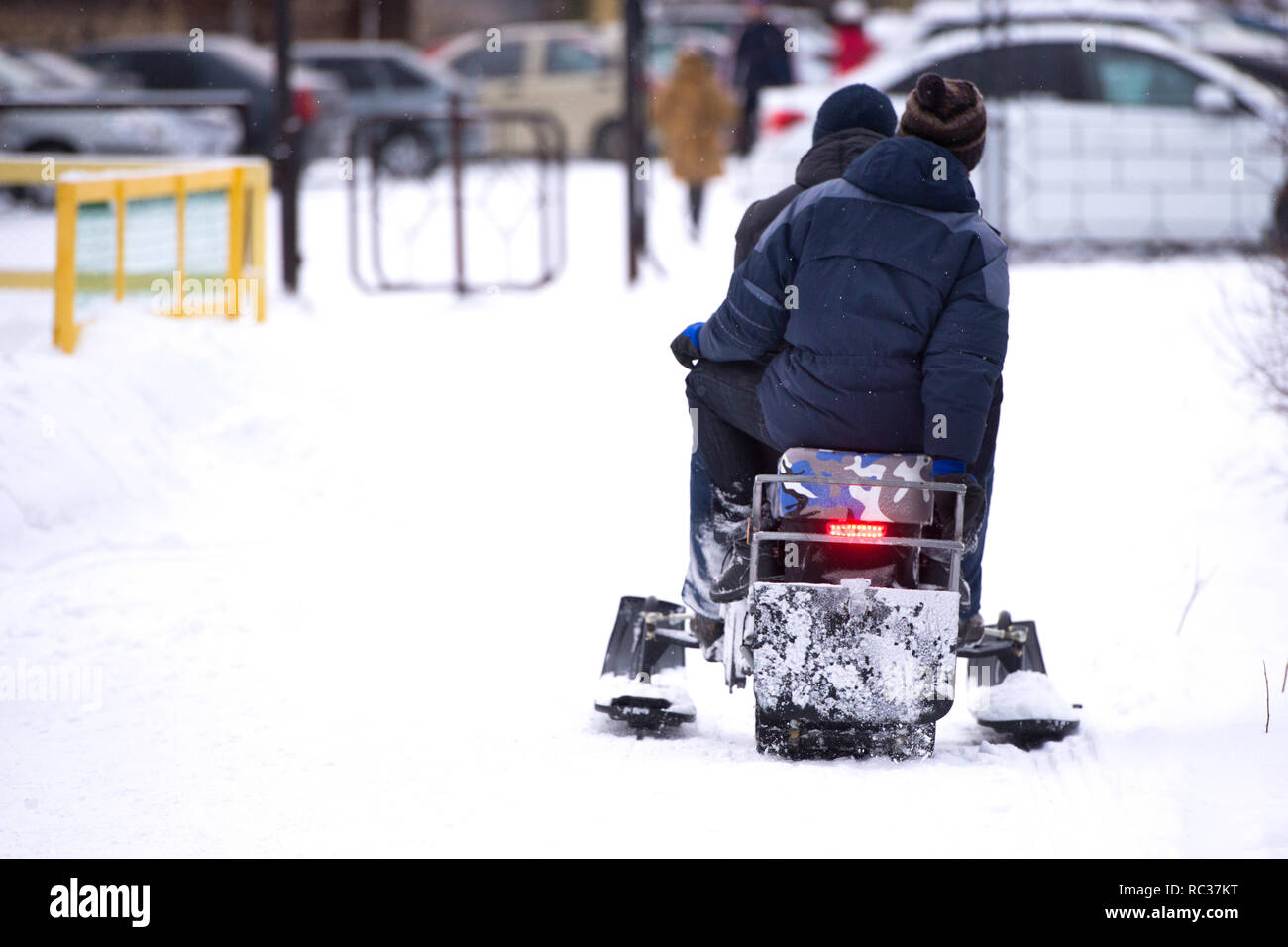 Man on a snowmobile hi-res stock photography and images - Alamy