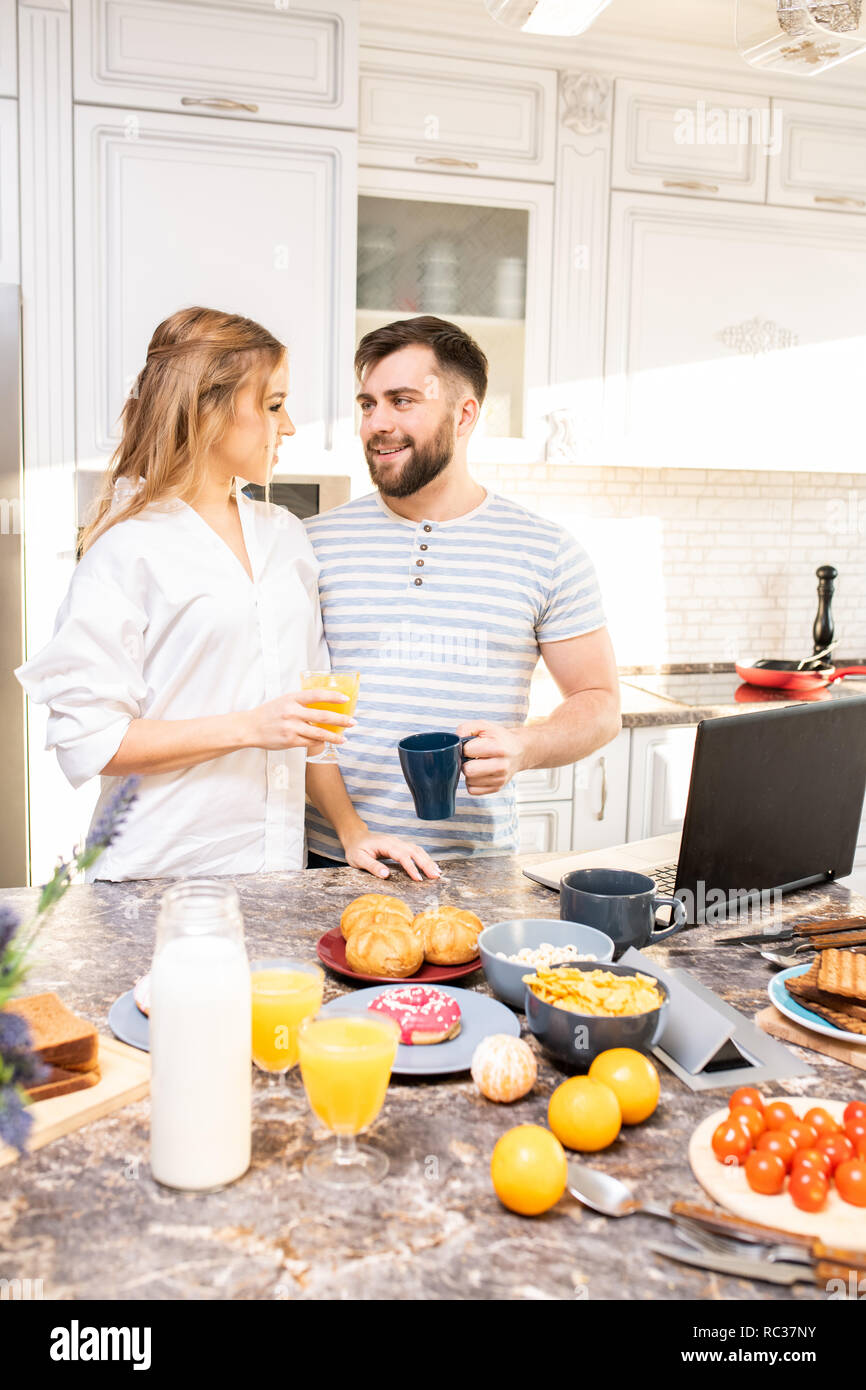 Young Couple Enjoying Breakfast Together Stock Photo - Alamy