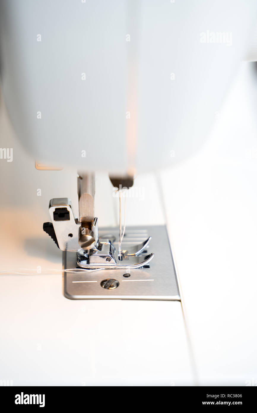 Closeup the sewing machine Stock Photo - Alamy