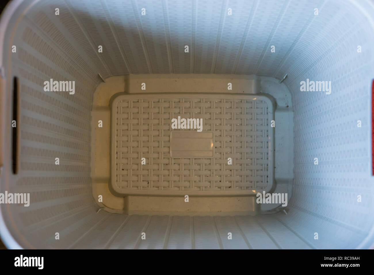 inside of a empty plastic laundry basket, household background Stock ...