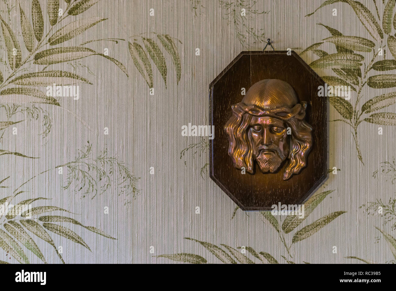Face of jesus christ sculpture on a wooden plank, religious background ...