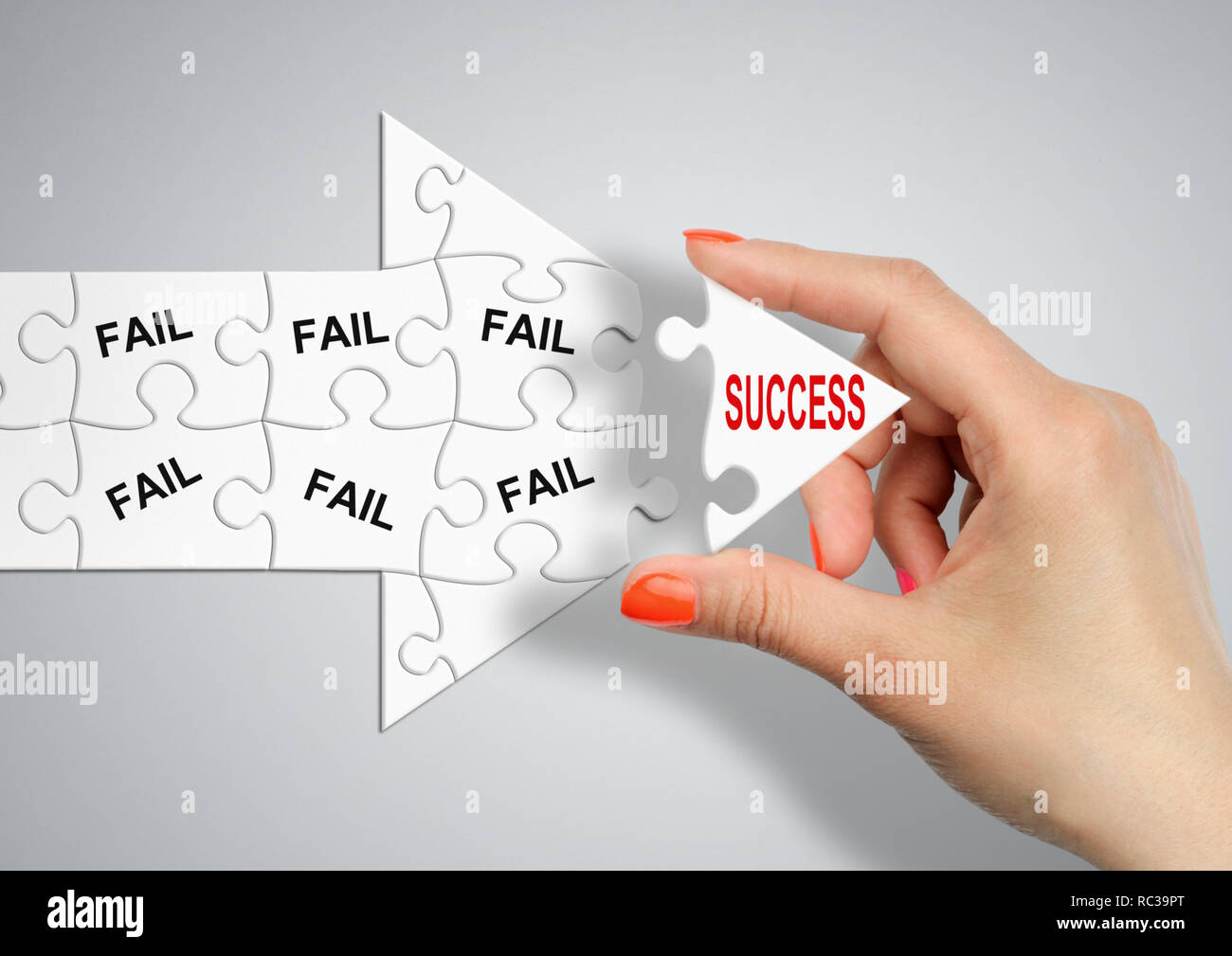Way to success concept, hand builds arrow with puzzles Stock Photo - Alamy