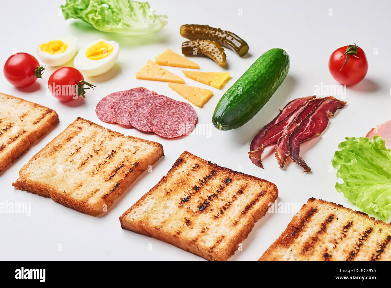 Sandwich ingredients on white background, top view Stock Photo - Alamy