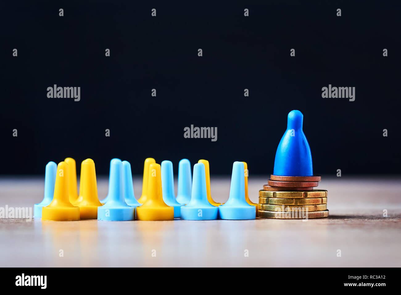 Income differences between rich and poor concept. Board game figure on ...