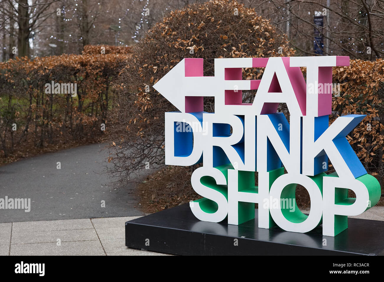 Eat drink shop sign in a park in London Stock Photo - Alamy