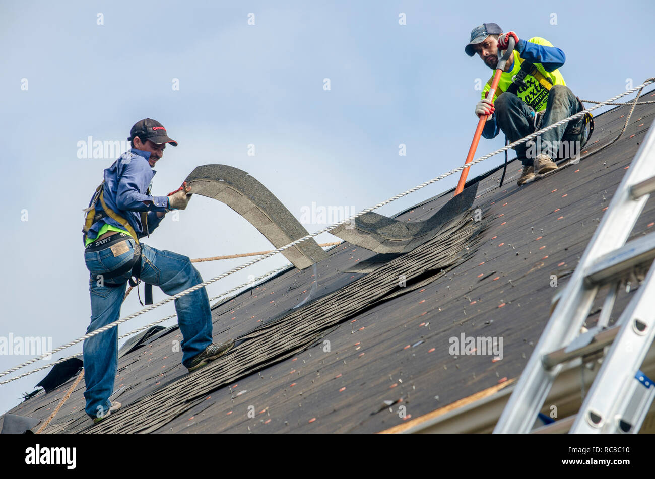 Installing asphalt roof construction hi-res stock photography and images - Alamy