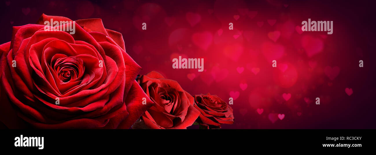 Red Roses In Heart Shape With Red Passion Background Stock Photo - Alamy