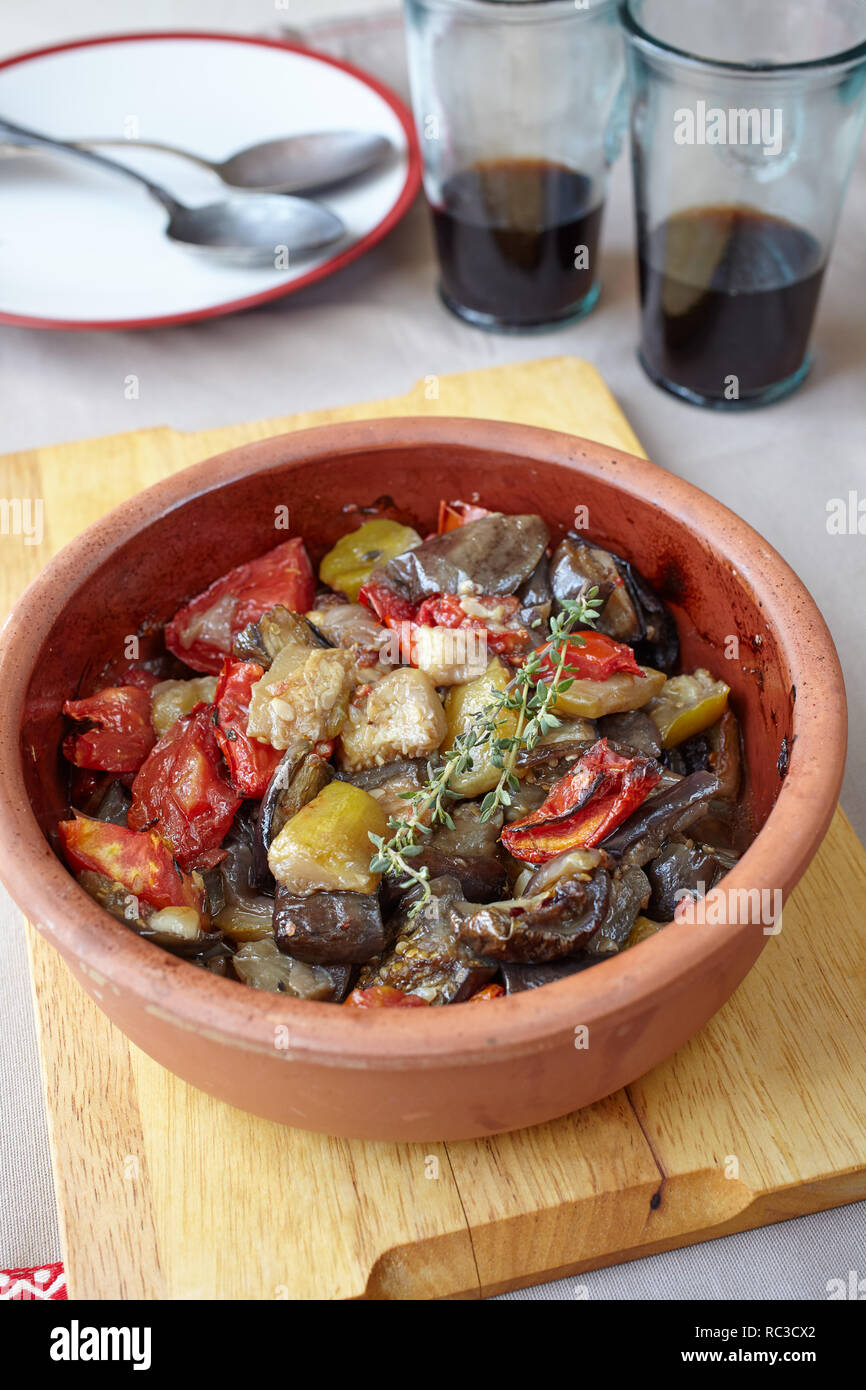 Ratatouille in a pot with thyme and red wine Stock Photo - Alamy