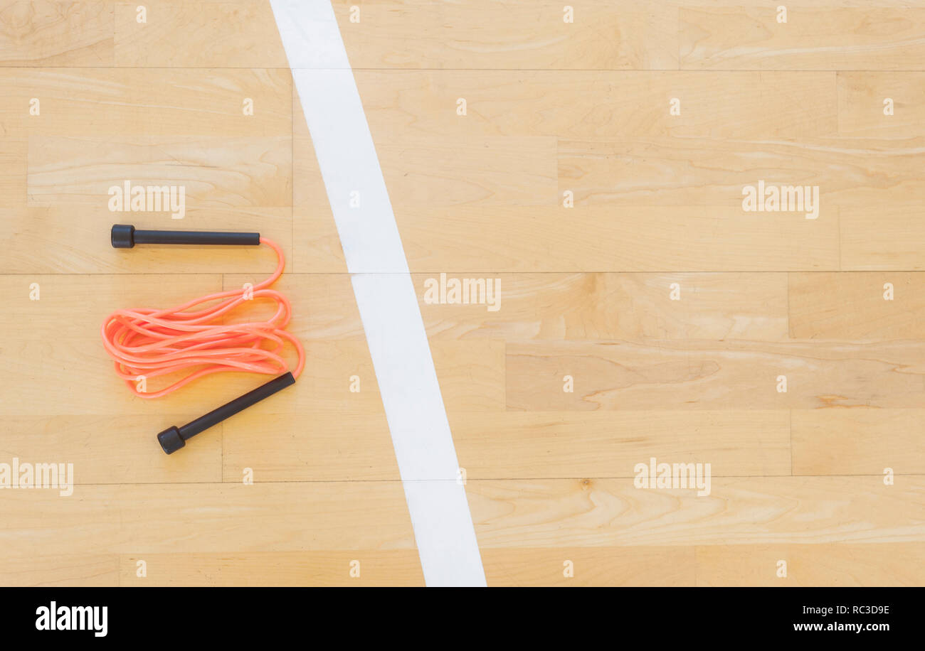 jump rope on wooden background. The view from the top Stock Photo - Alamy