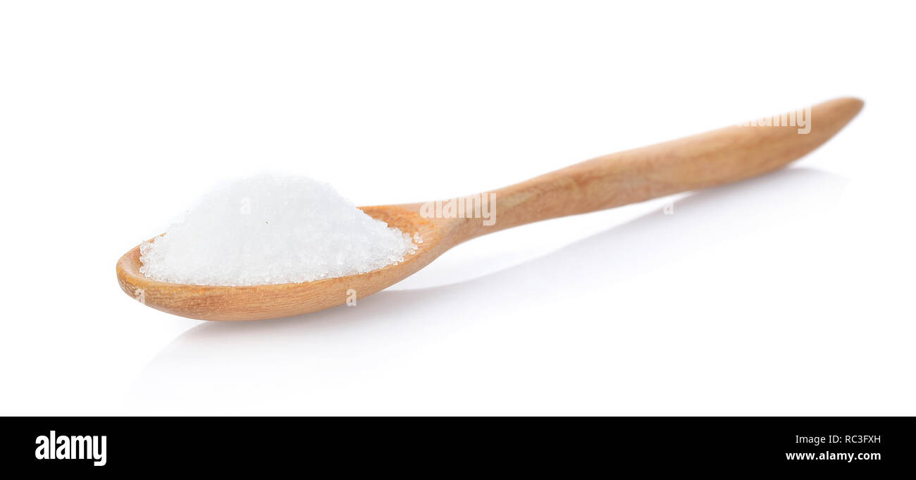 Salt in wooden spoon on white background Stock Photo - Alamy