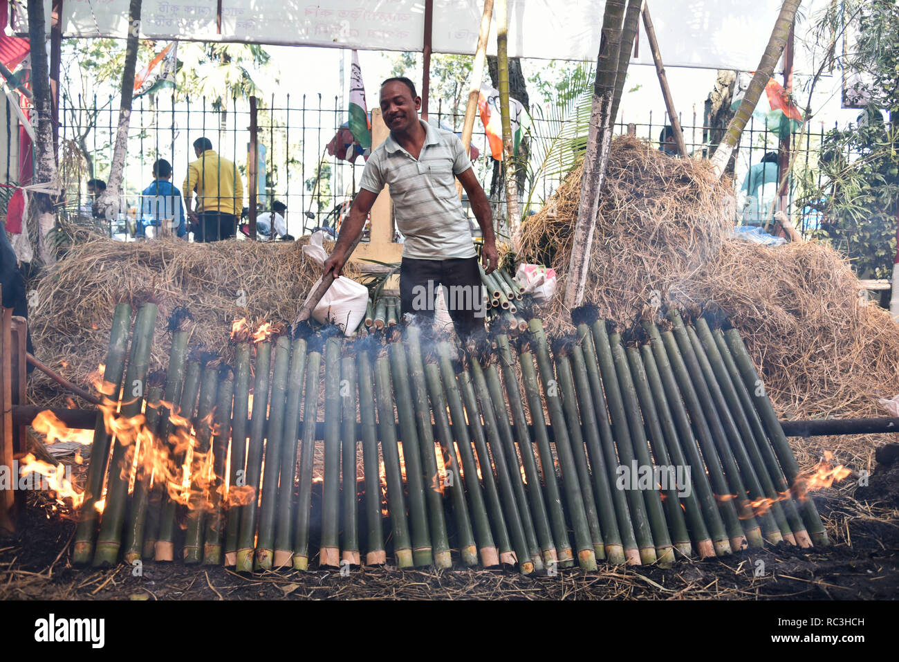 Guwahati, Assam, India. 13th January 2019. Man preparing Sunga Pitha ...
