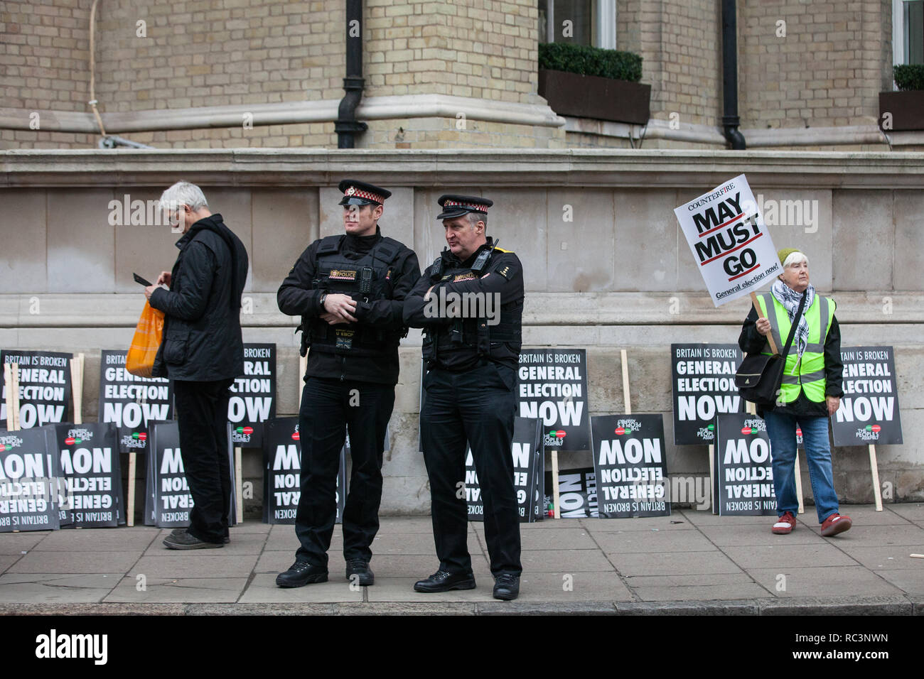 London, UK. 12th January, 2019. Police officers observe hundreds of ...