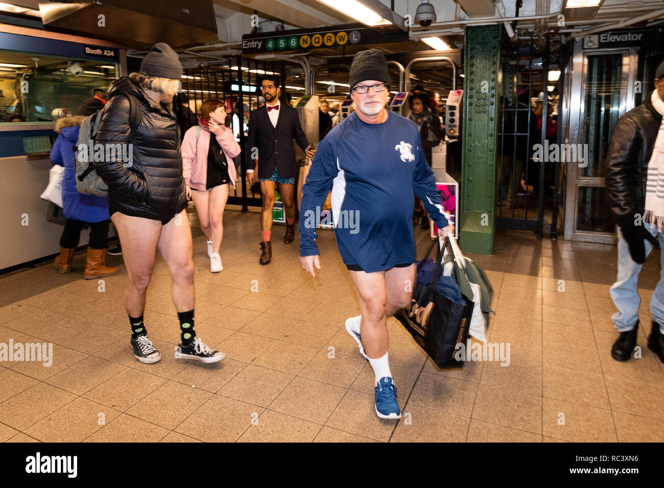 Subway riders without pants participating in the annual No Pants Subway ...