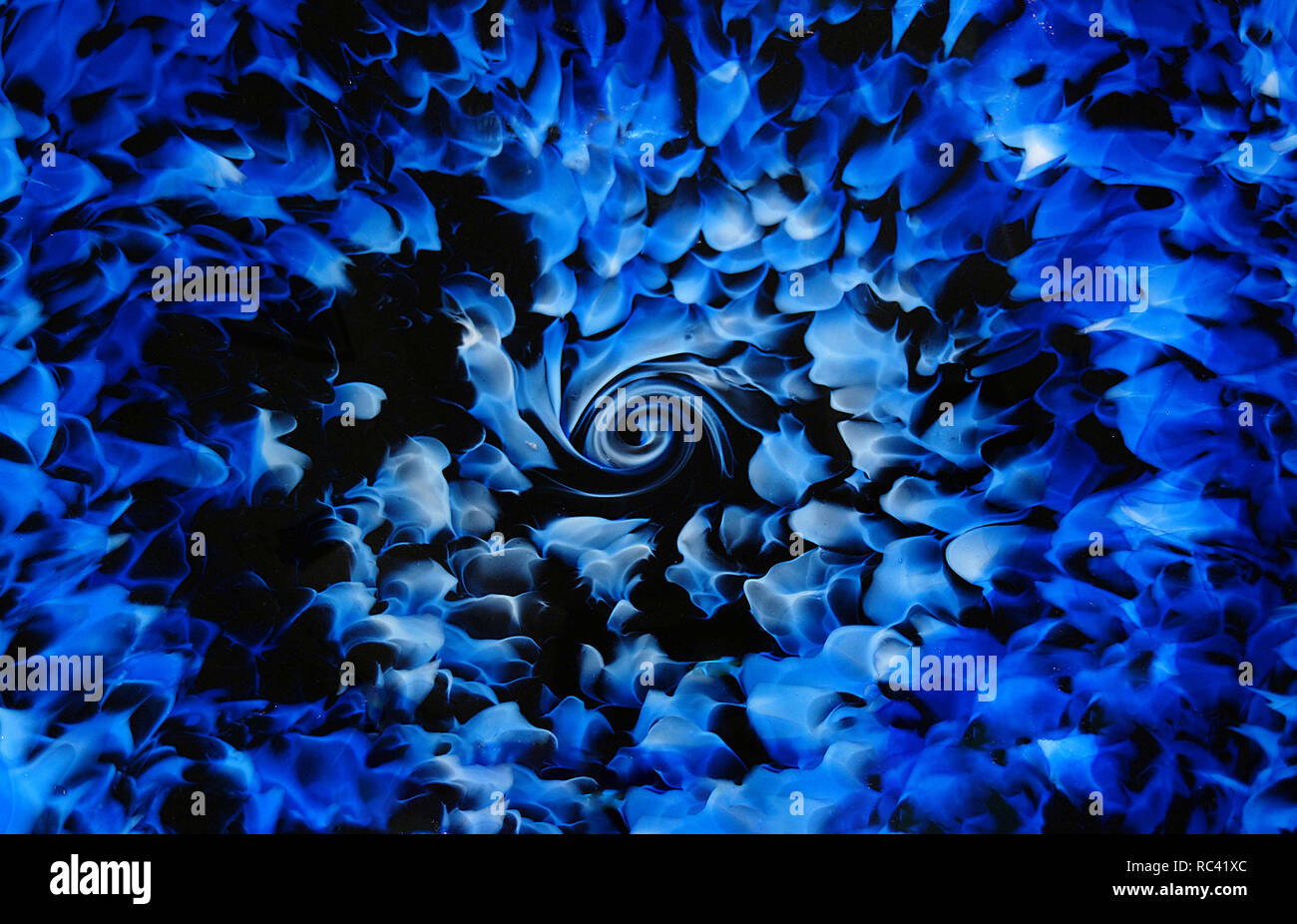 close up abstract blue and black glass design with swirl center Stock ...
