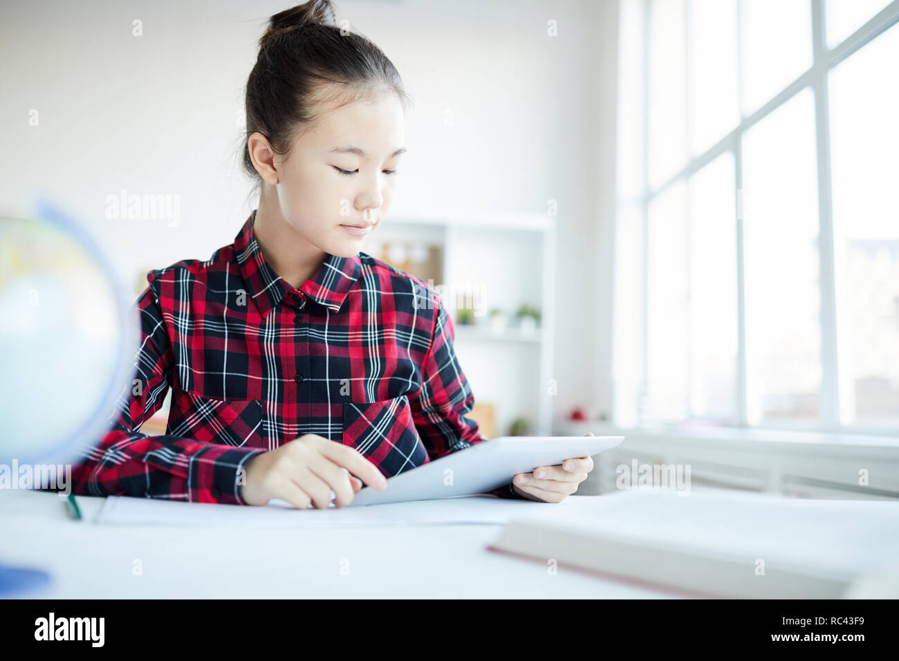 Girl with touchpad Stock Photo - Alamy