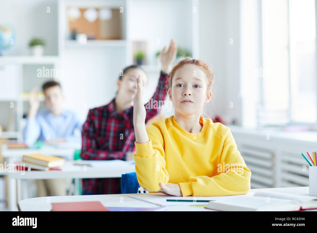 School girl answer hi-res stock photography and images - Alamy