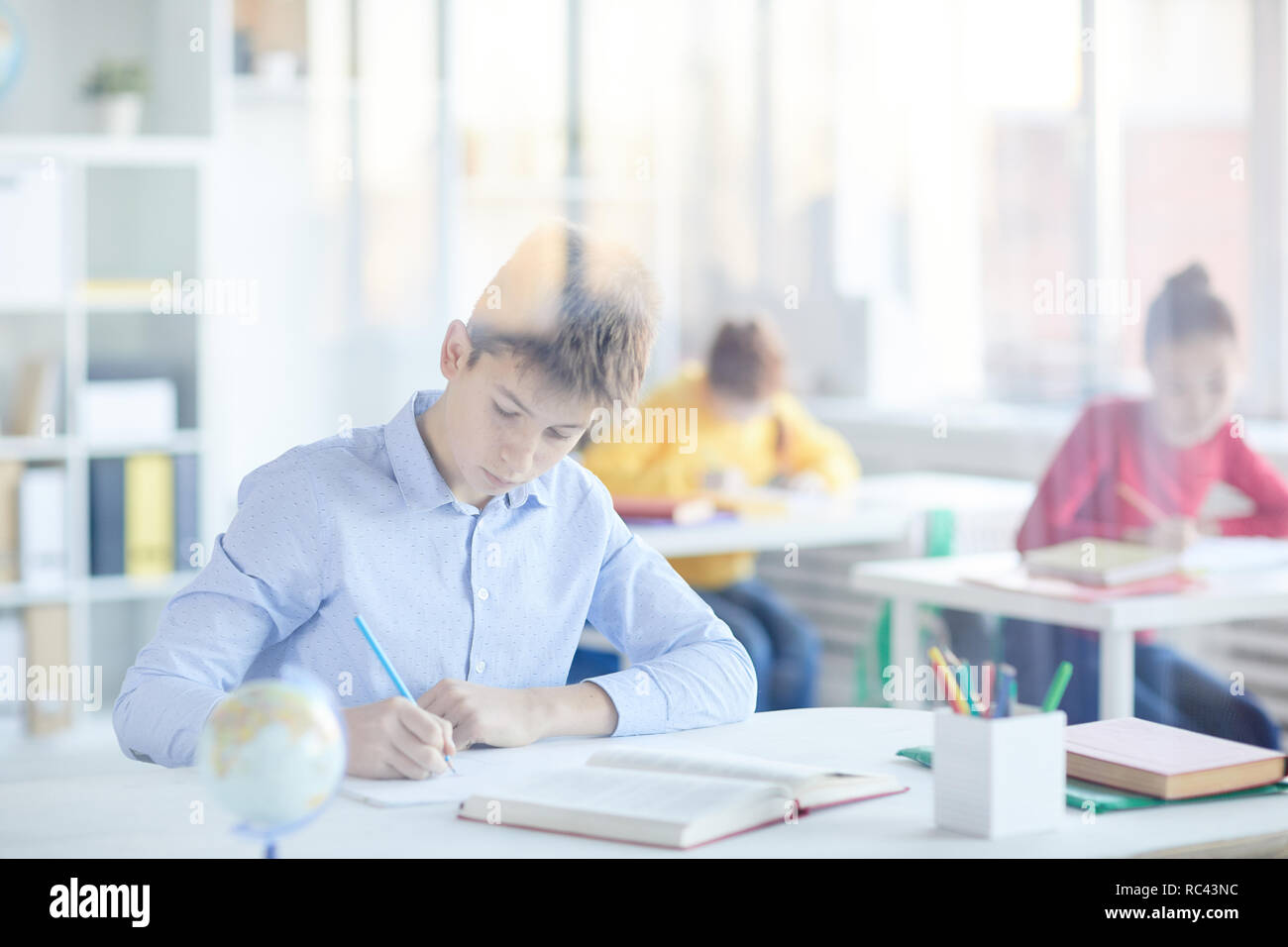 Pupils at lesson Stock Photo - Alamy