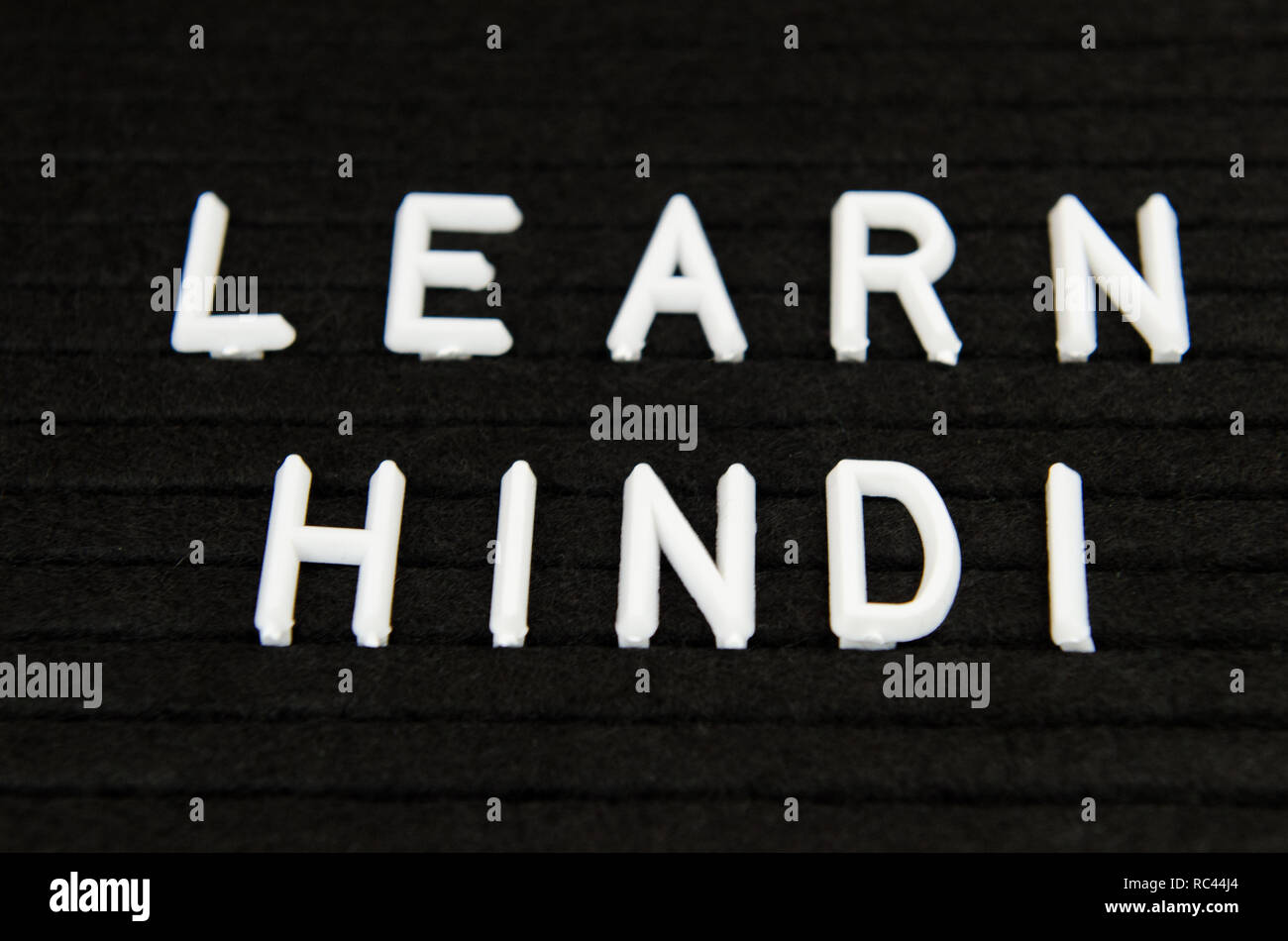 learn language sign on black background Stock Photo - Alamy