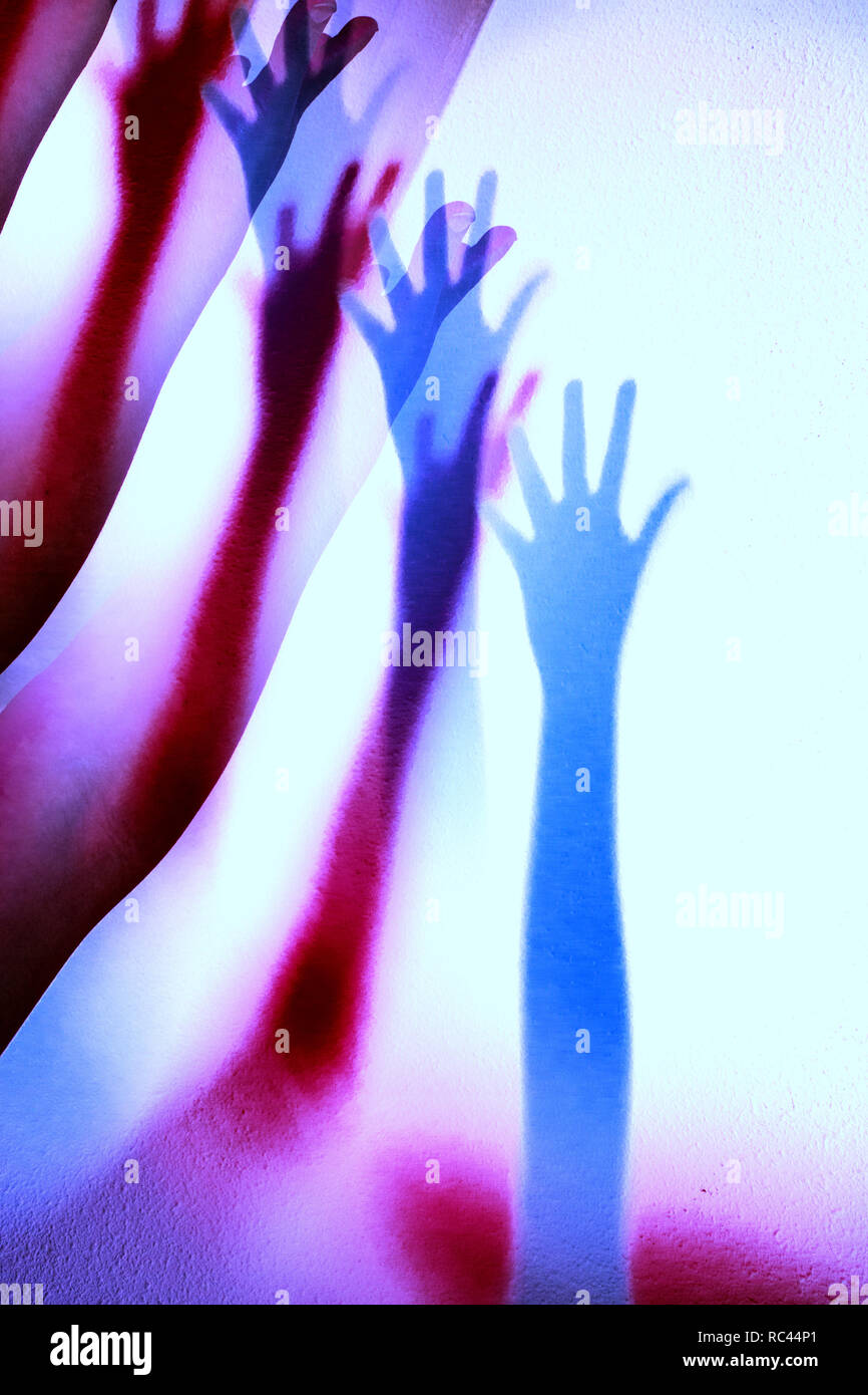 Extended arm with shadow in color, feeling of loneliness Stock Photo ...