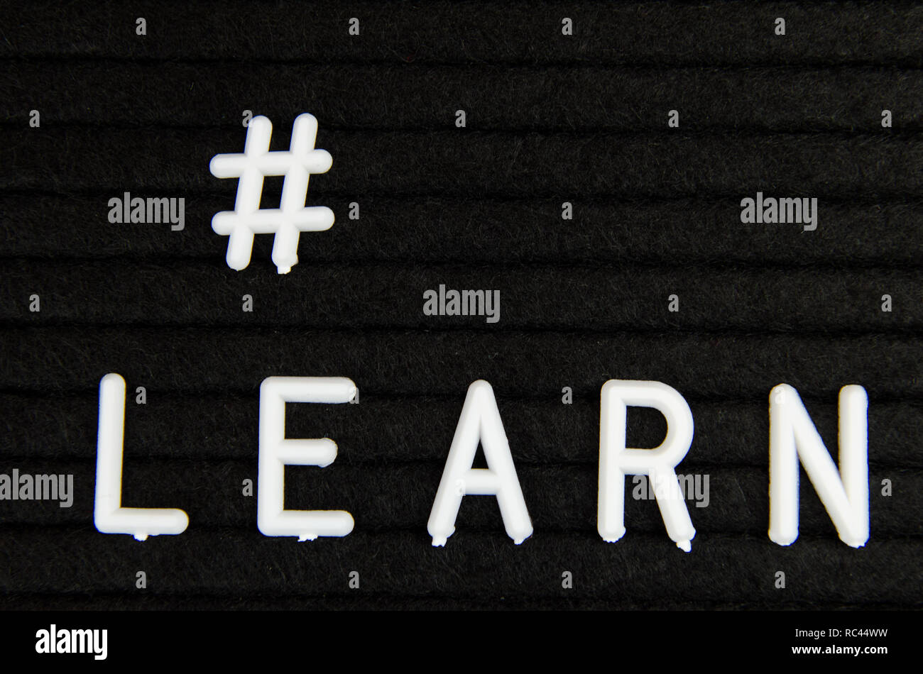 learn sign on black background Stock Photo - Alamy