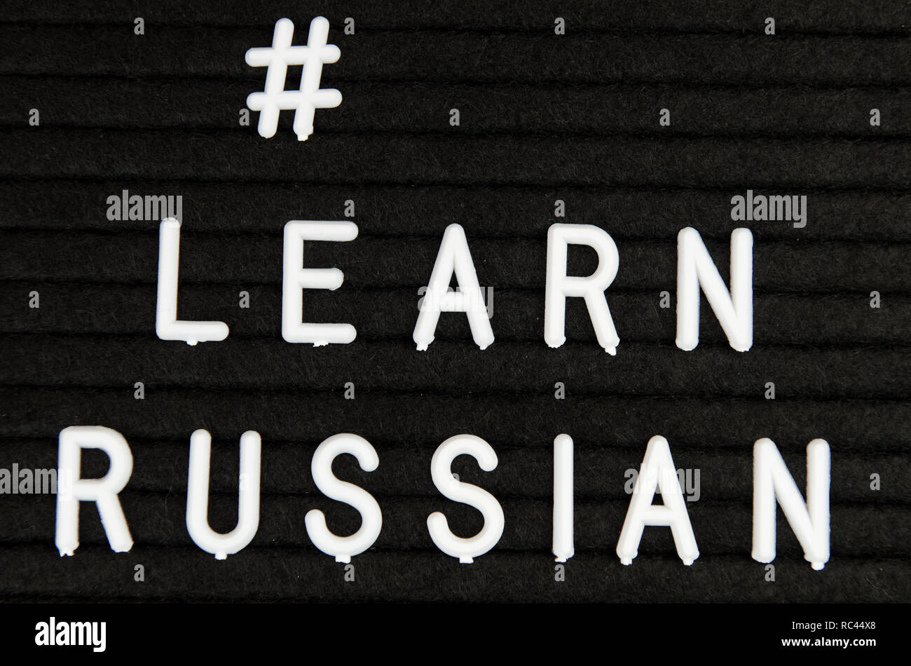 learn language sign on black background Stock Photo - Alamy