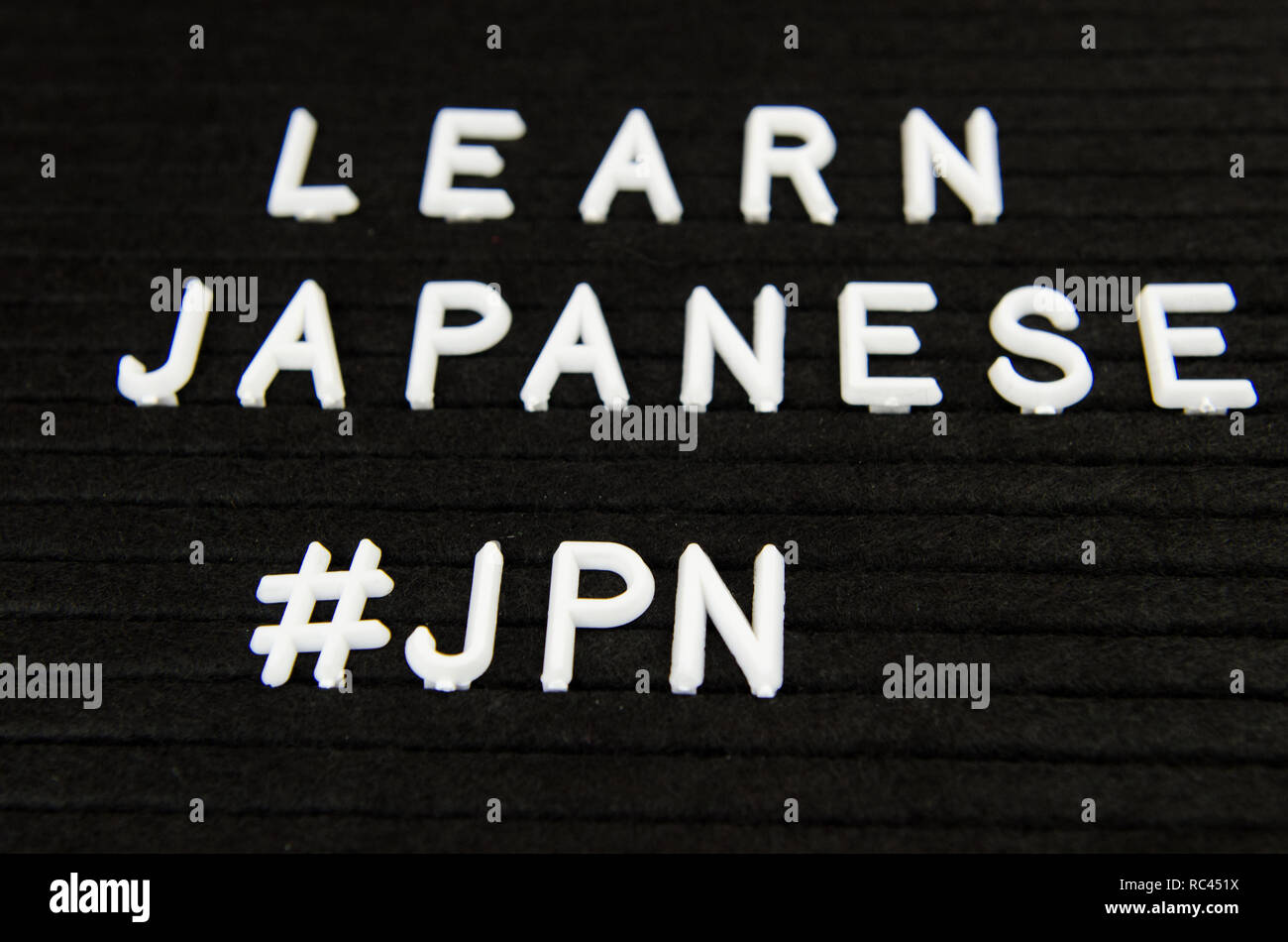 learn language sign on black background Stock Photo - Alamy