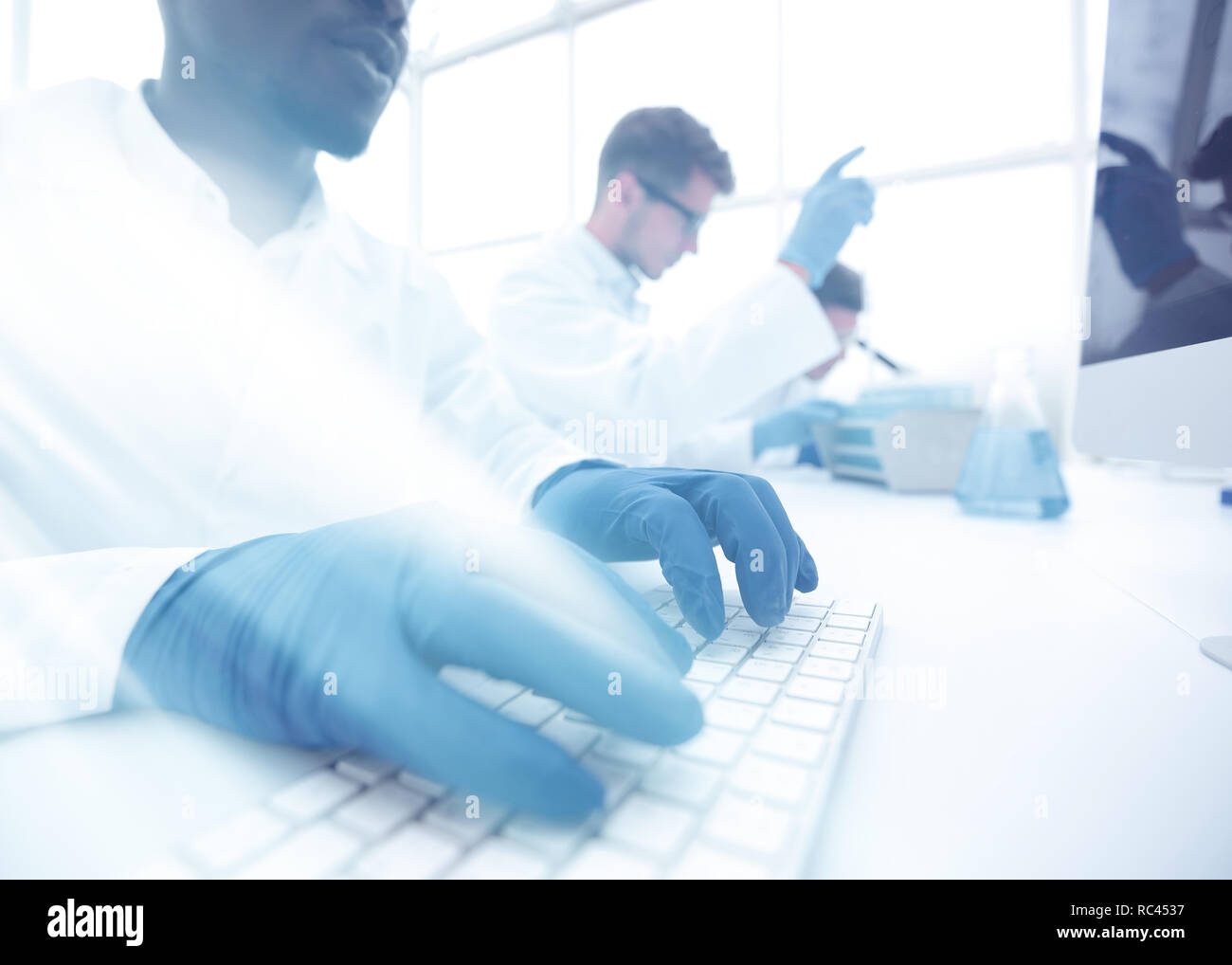 Scientist research computer keyboard hi-res stock photography and ...