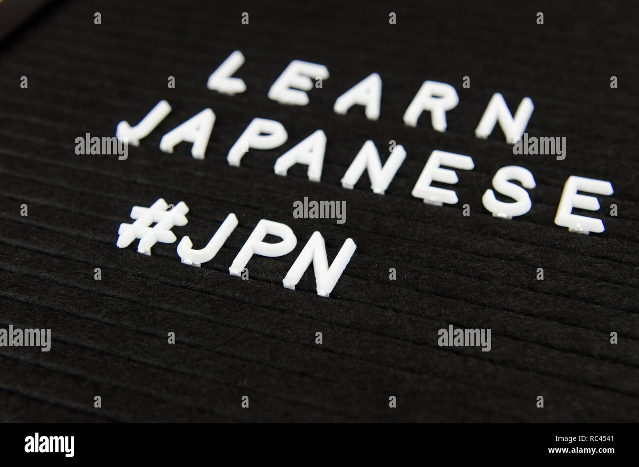 learn language sign on black background Stock Photo - Alamy
