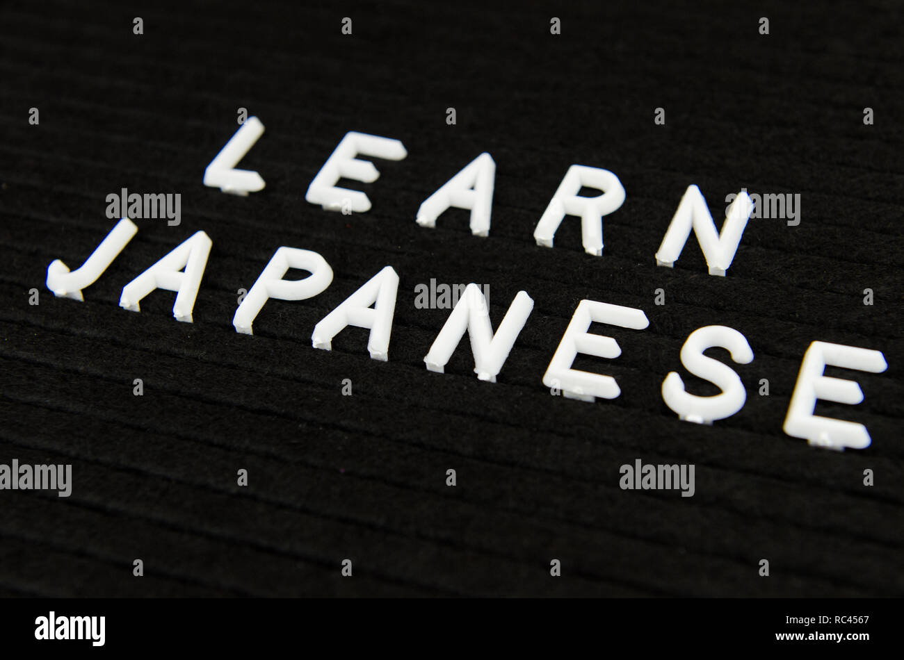 learn language sign on black background Stock Photo - Alamy