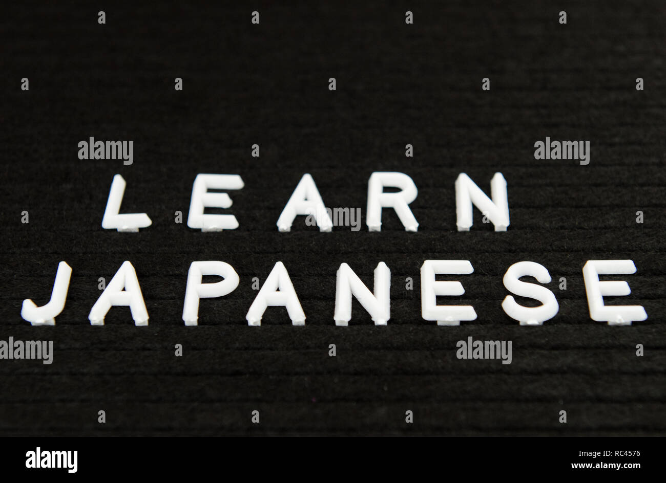 learn language sign on black background Stock Photo - Alamy