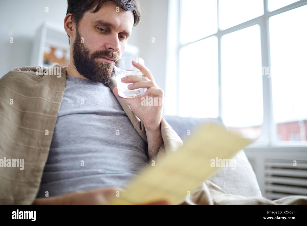 Person reading bill hi-res stock photography and images - Alamy