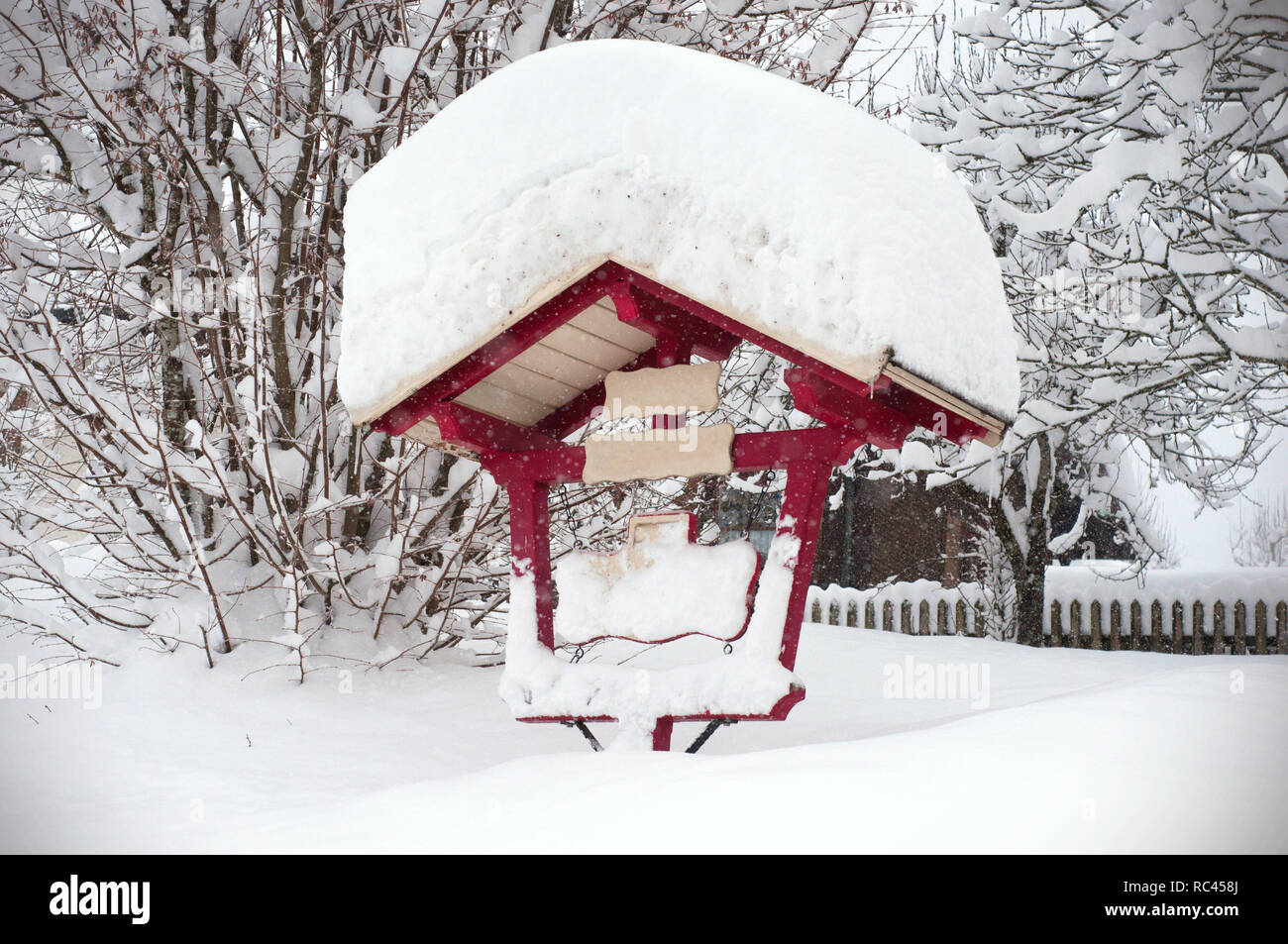 Snow on roof after two days of snowfalls. Snow cyclone in Europe. House ...