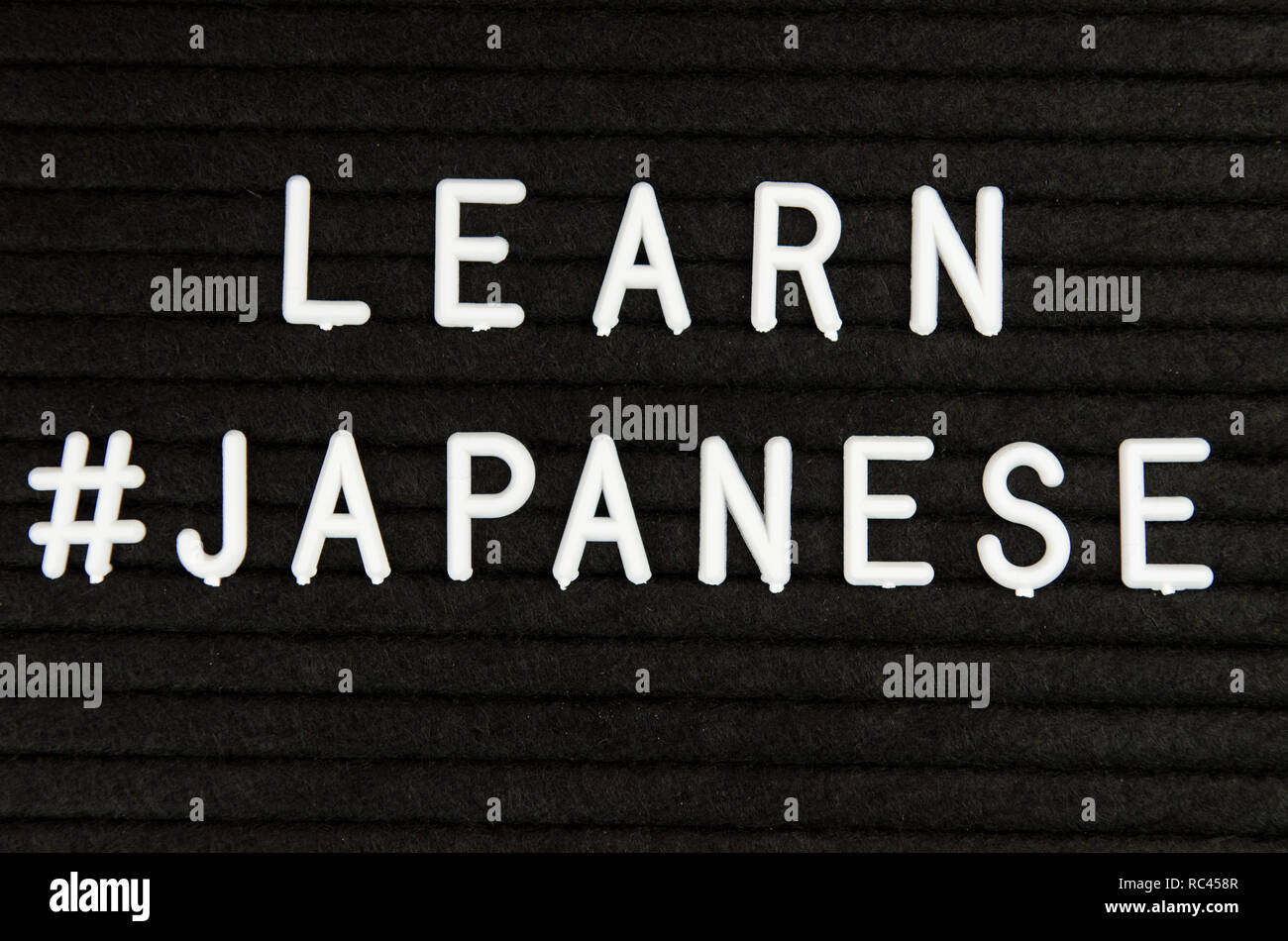 learn language sign on black background Stock Photo - Alamy