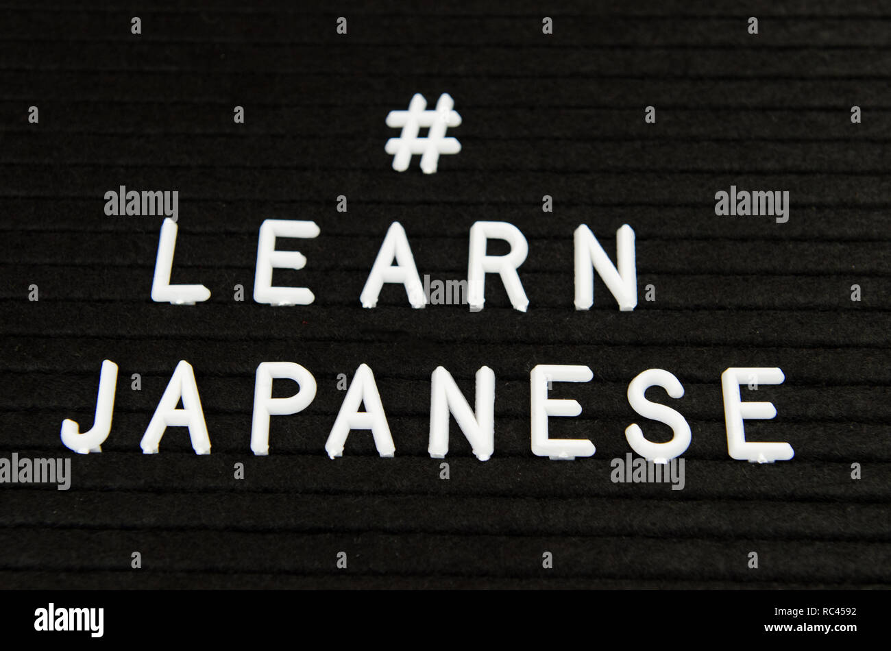 learn language sign on black background Stock Photo - Alamy