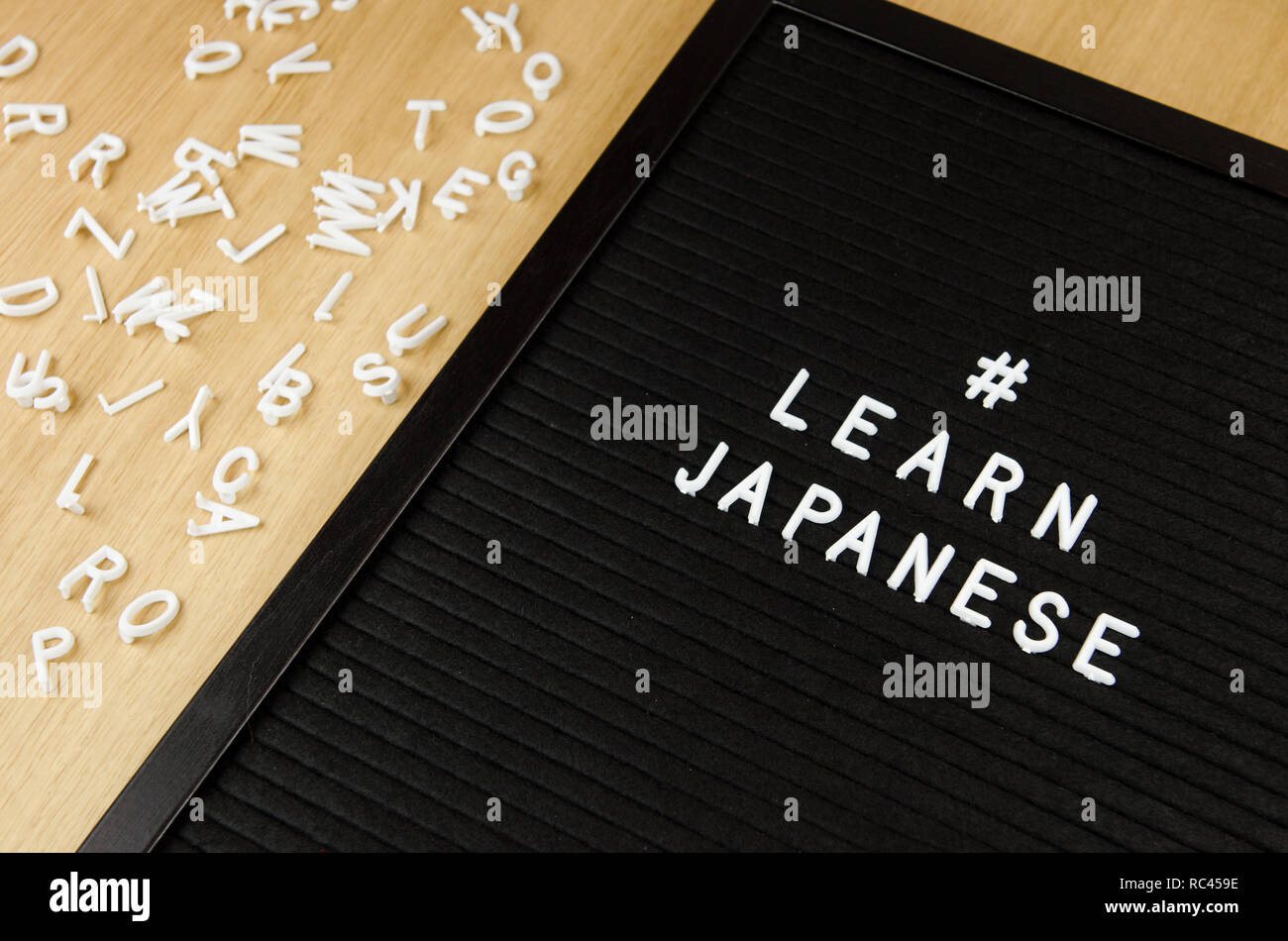 learn language sign on black background Stock Photo - Alamy