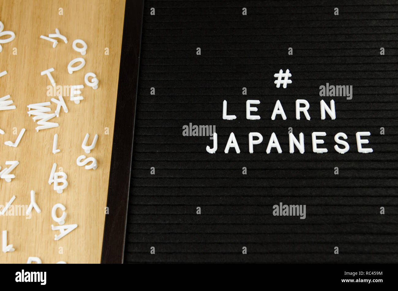 learn language sign on black background Stock Photo - Alamy