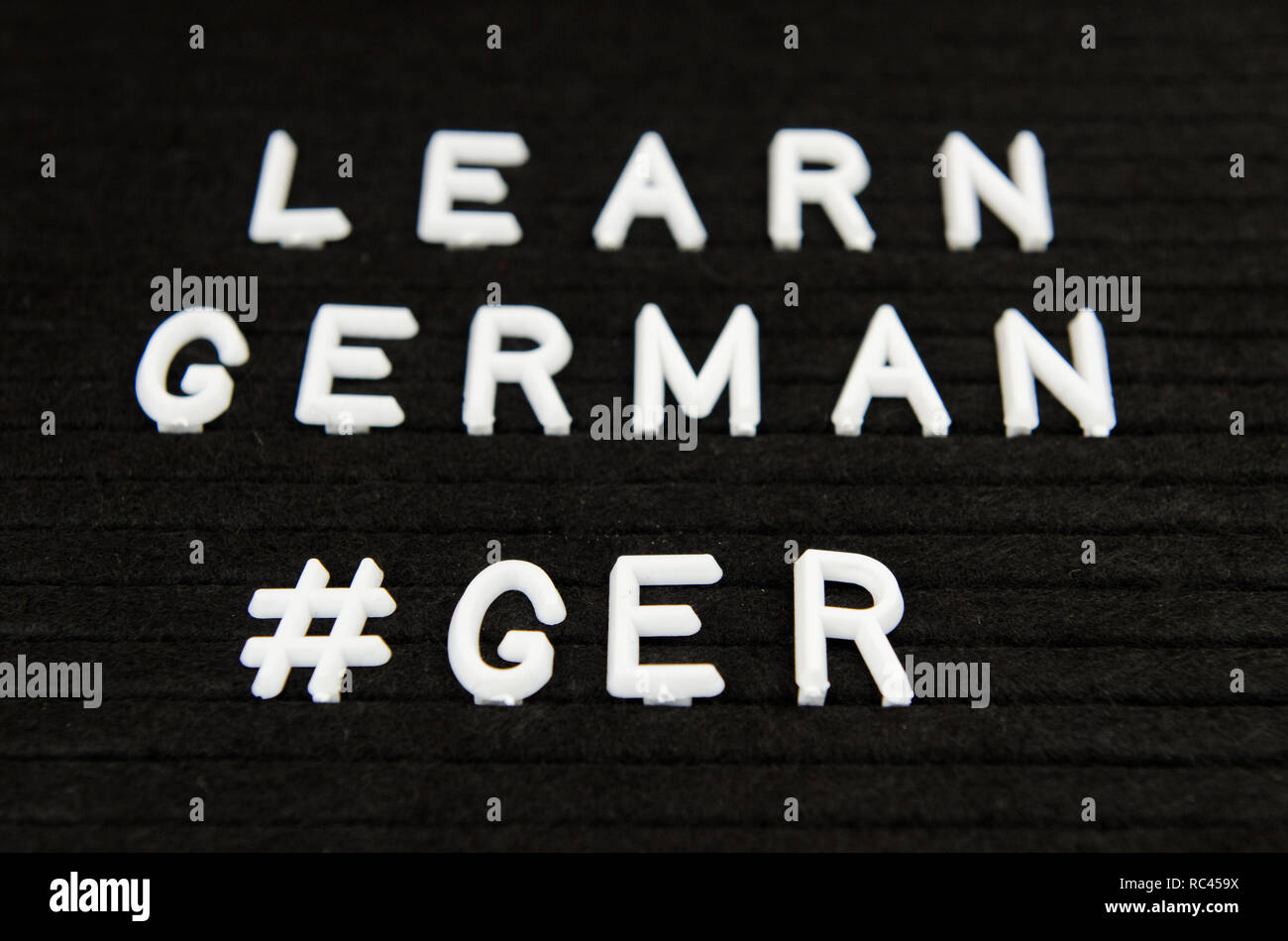 learn language sign on black background Stock Photo - Alamy