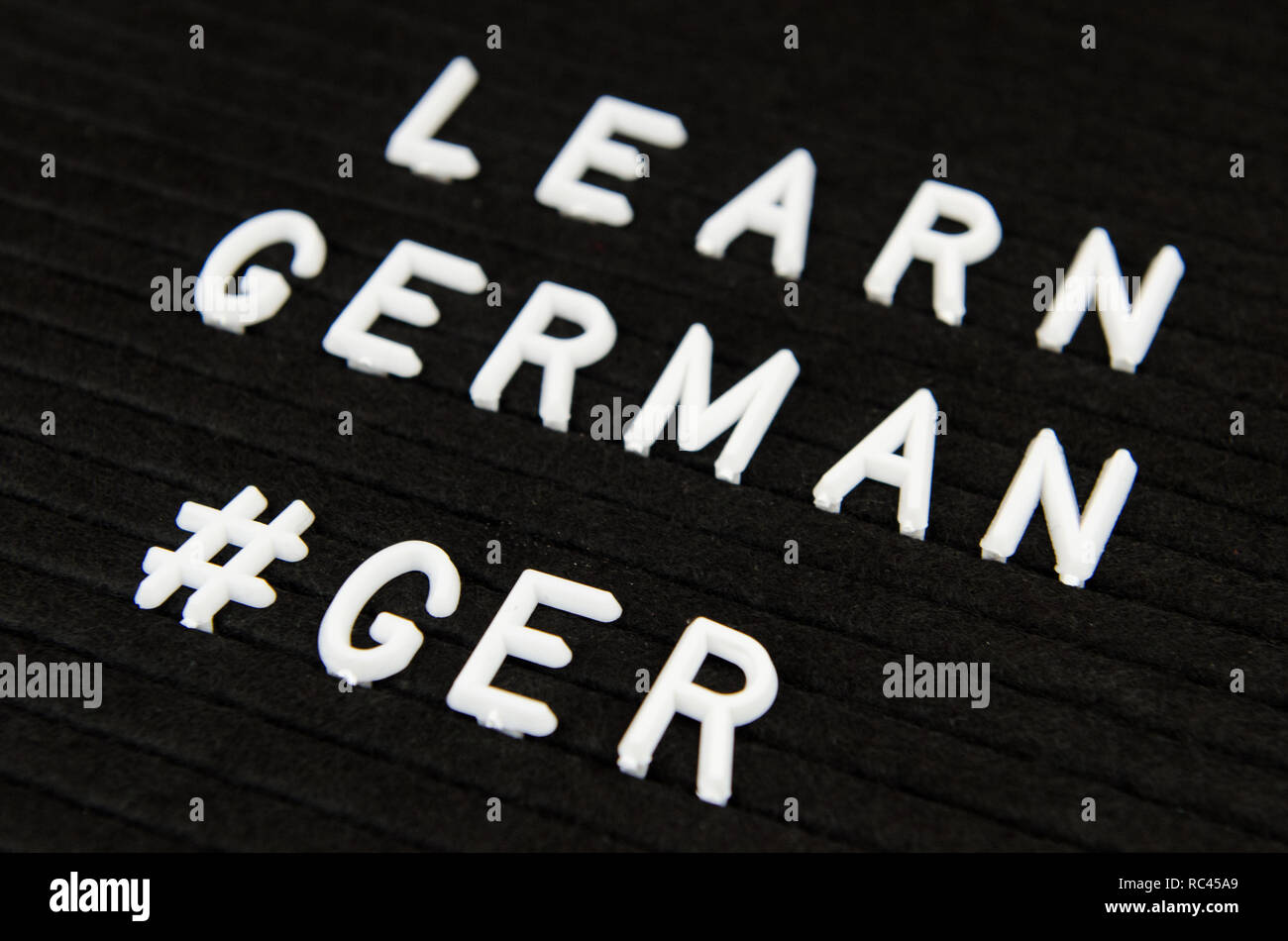 learn language sign on black background Stock Photo - Alamy