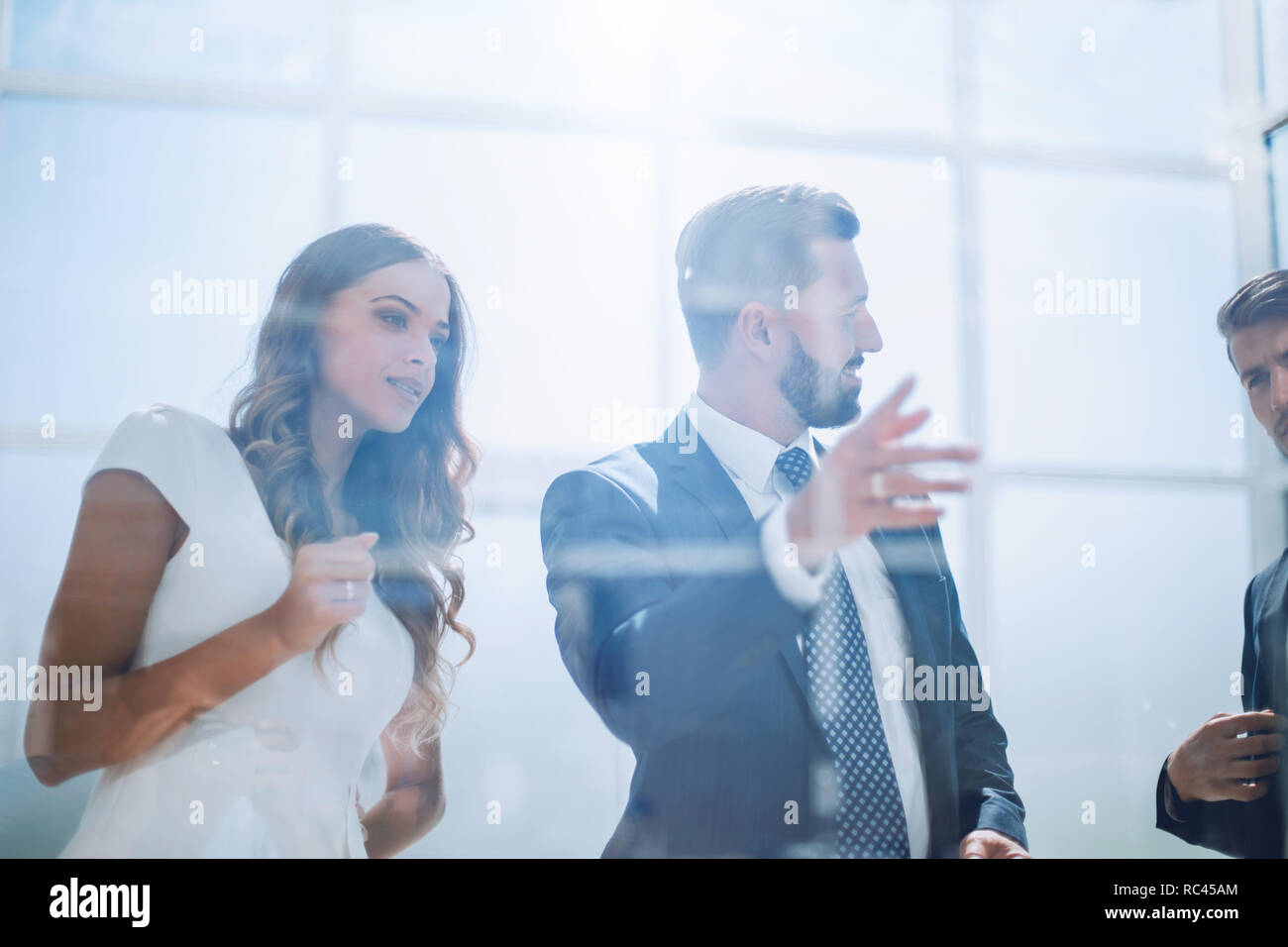 businessman pointing finger at the office window Stock Photo - Alamy