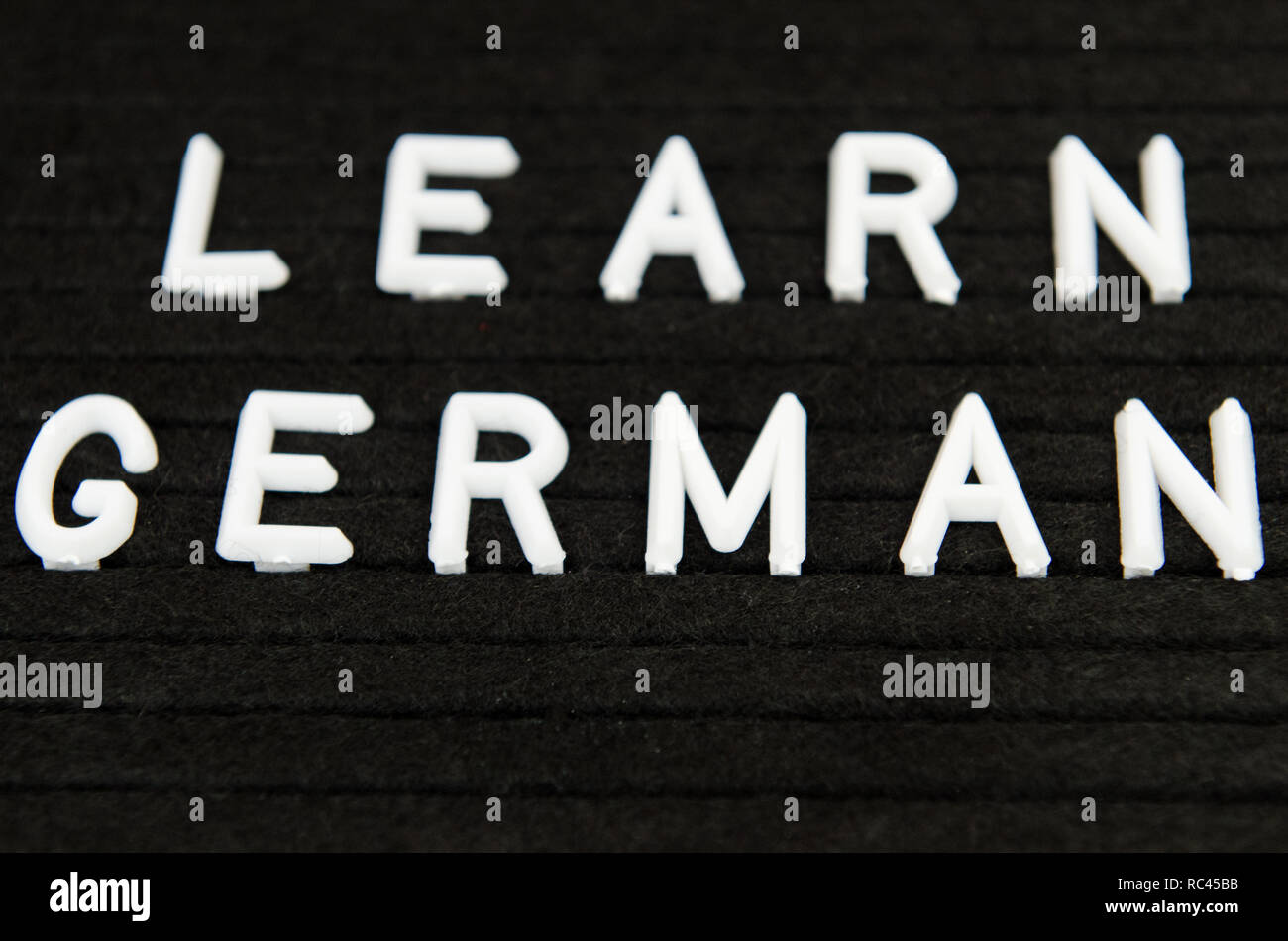 learn language sign on black background Stock Photo - Alamy