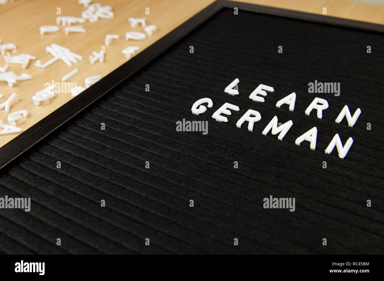 learn language sign on black background Stock Photo - Alamy