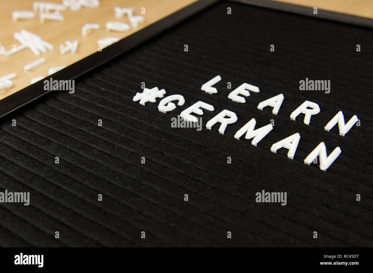 learn language sign on black background Stock Photo - Alamy