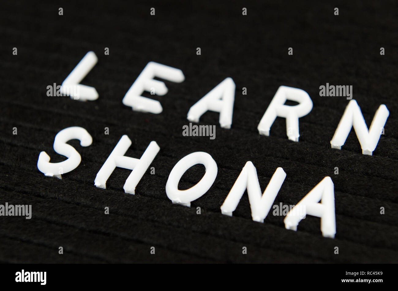 learn language sign on black background Stock Photo - Alamy