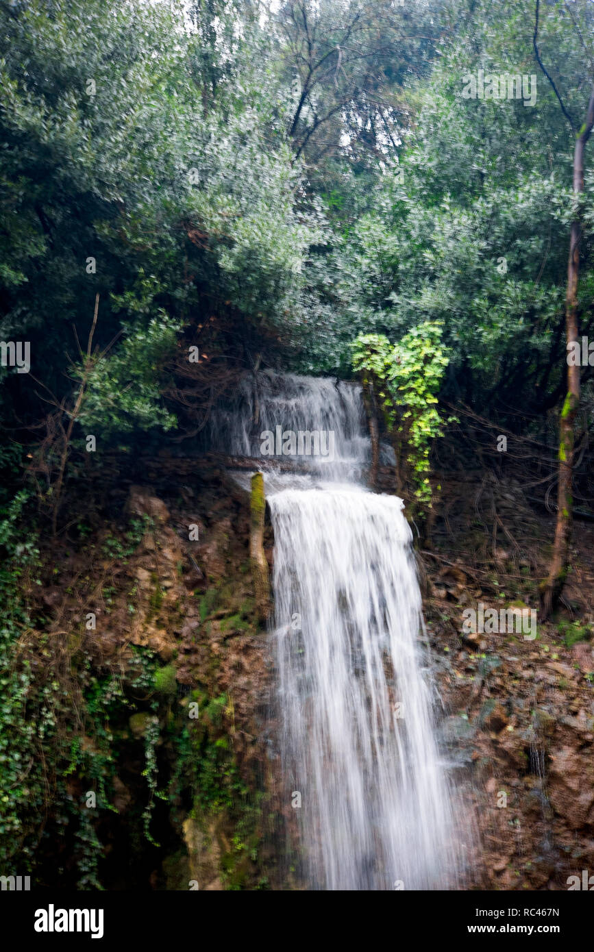 Waterfall flowing from mountain Stock Photo - Alamy