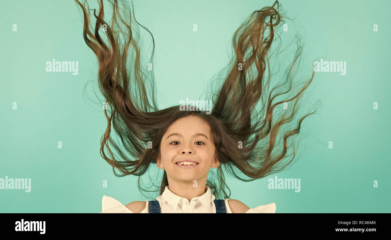 Hairdresser salon for girls concept. Hairdresser child model smile with ...