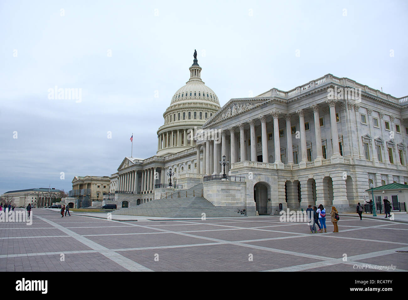 Right side angle view of US Capitol building with overcast sky Stock ...