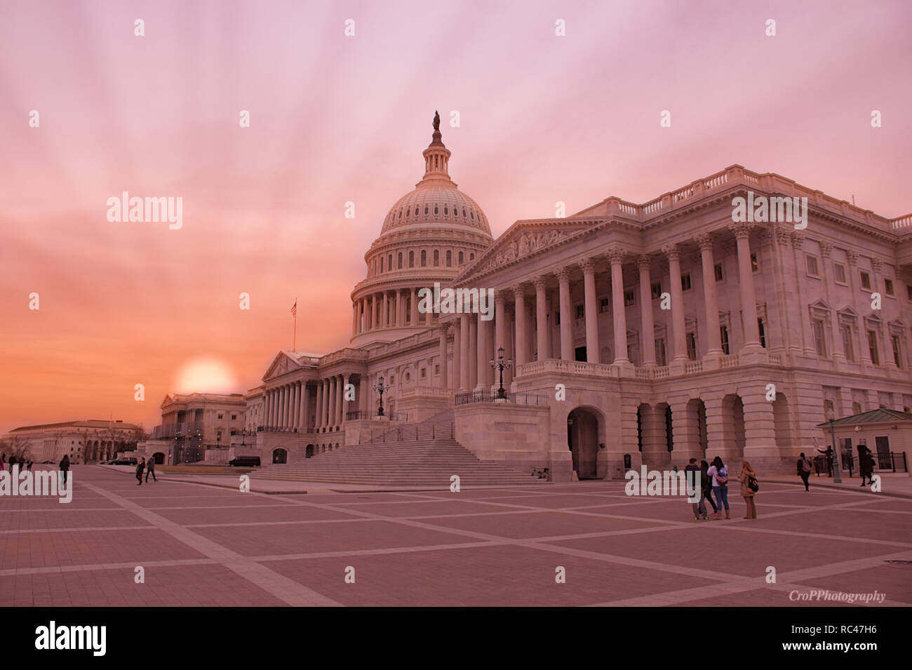 Sunset side angle view of US Capitol building Stock Photo - Alamy