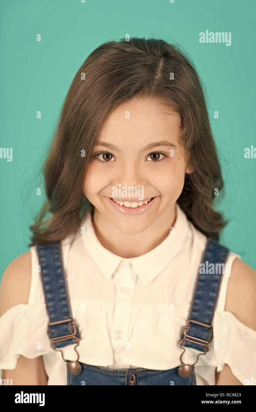 Child, childhood concept. Kid model smile with long healthy brunette ...